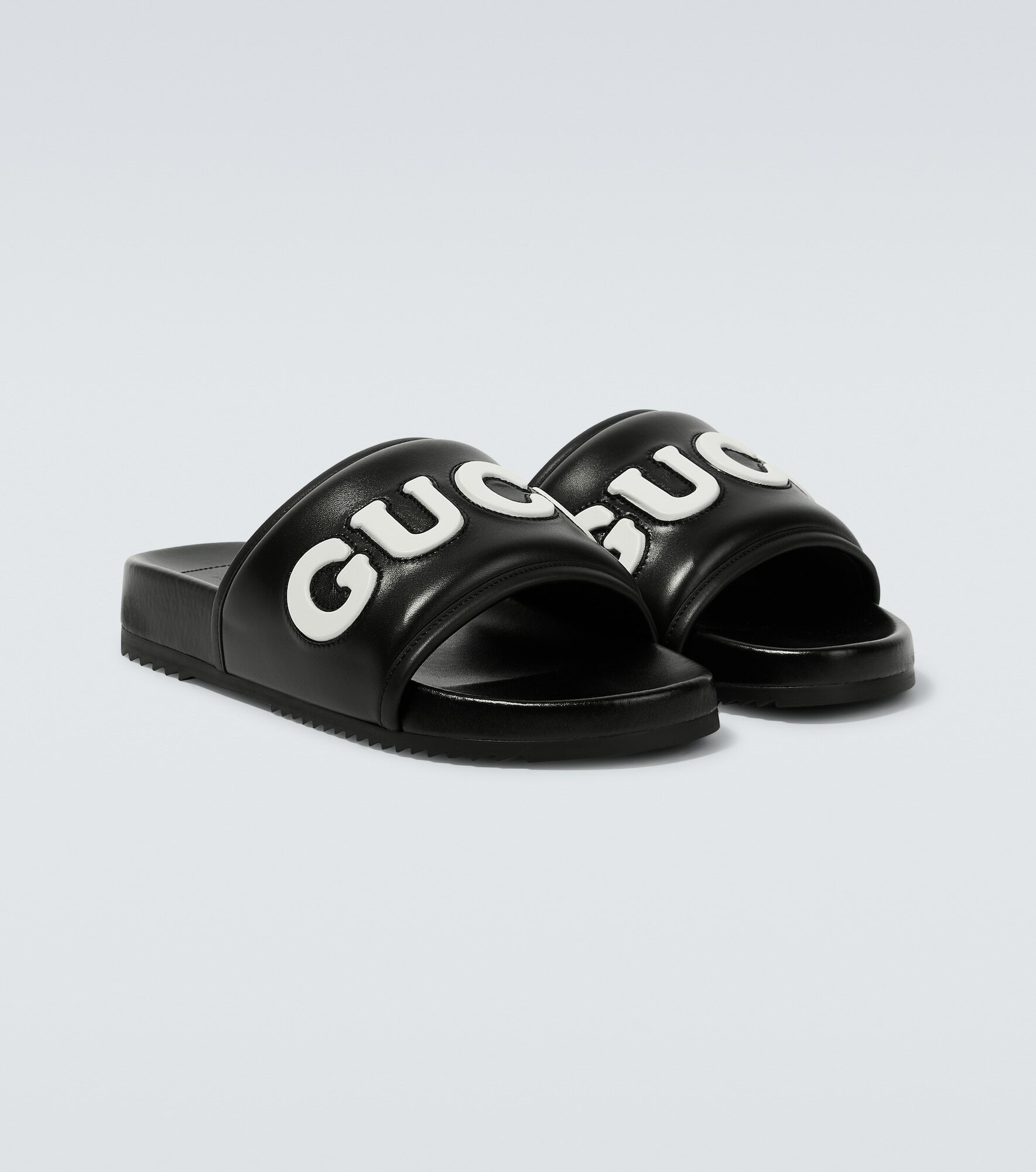 Gucci - Logo leather slides Gucci