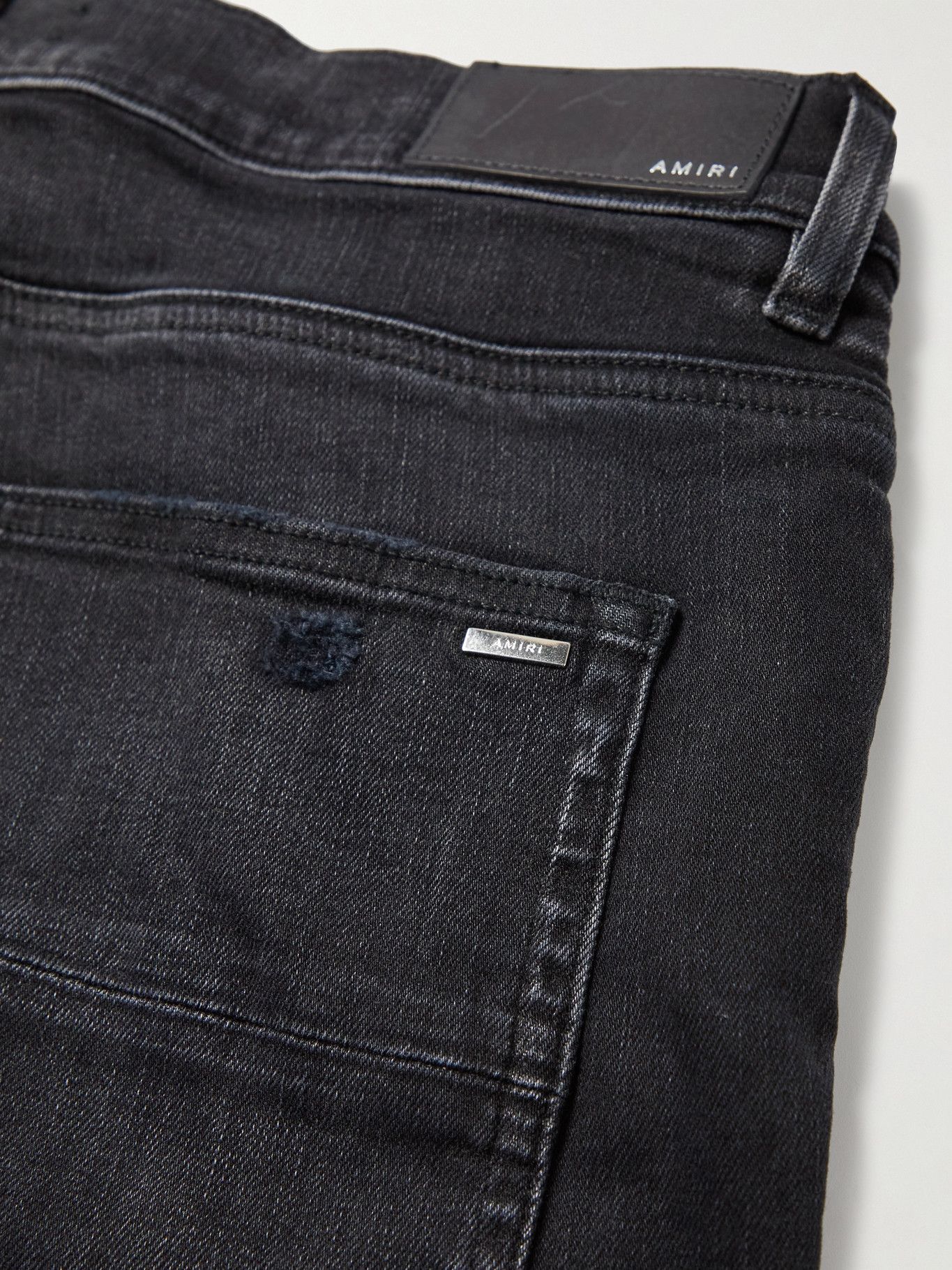AMIRI - Skinny-Fit Logo-Appliquéd Distressed Jeans - Black Amiri